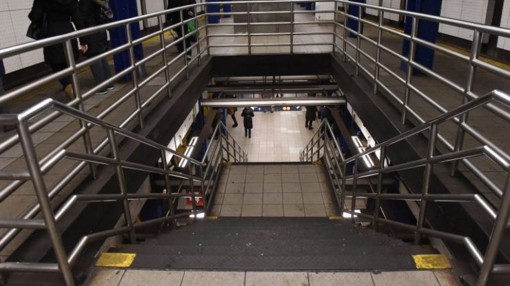 Woman holding 1-year-old, stroller dies in fall down subway station ...