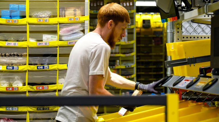 A look inside Amazon’s Staten Island fulfillment center, run with help ...