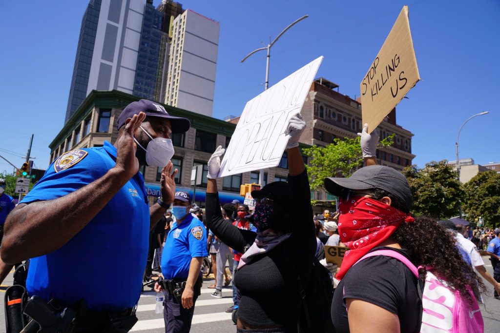 18 defining photos during an afternoon of protests across Manhattan ...