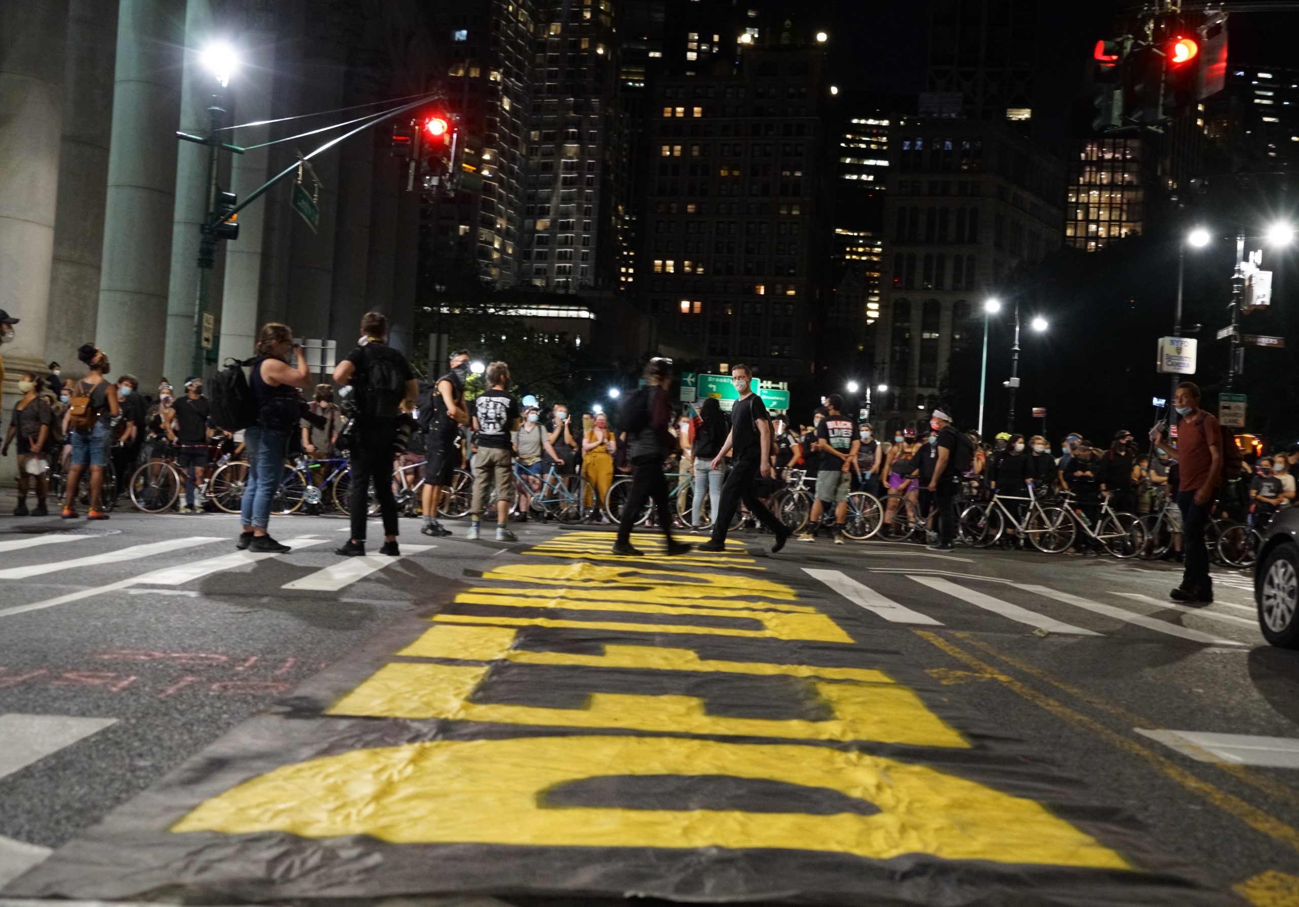 Protesters barricade themselves, paint over security cameras in ongoing ...
