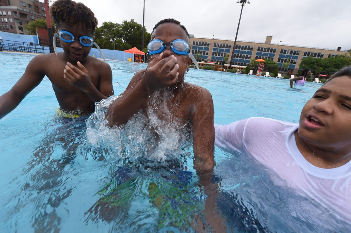 Eight NYC pools reopen despite rainy weather