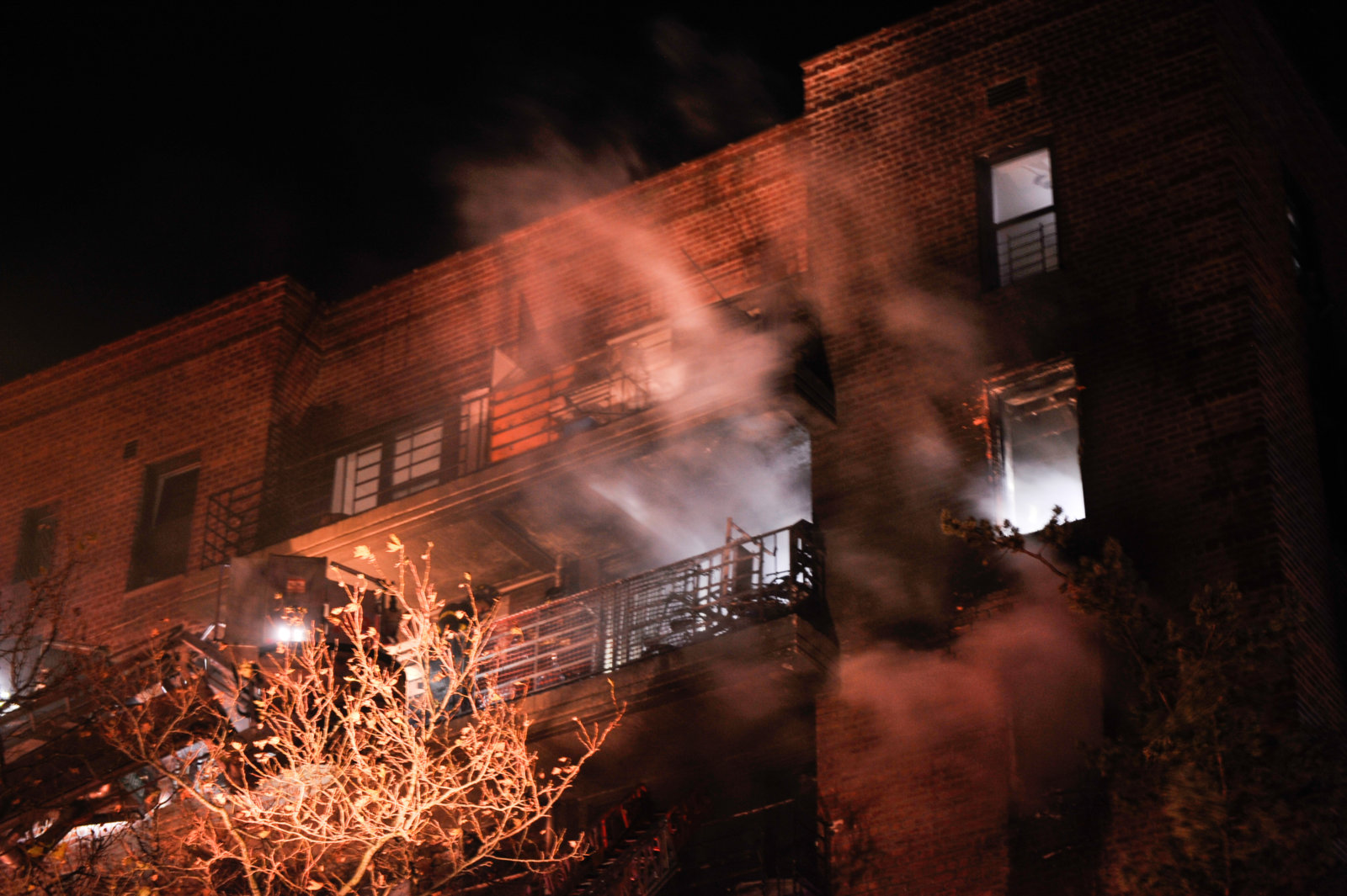 Fast-moving, three-alarm Queens high-rise fire injures four residents ...