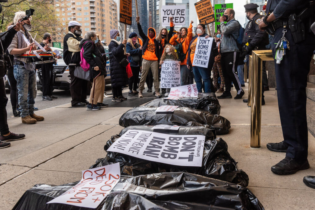 ‘Time to go’: Protesters in Midtown leave bodybags at Trump properties ...