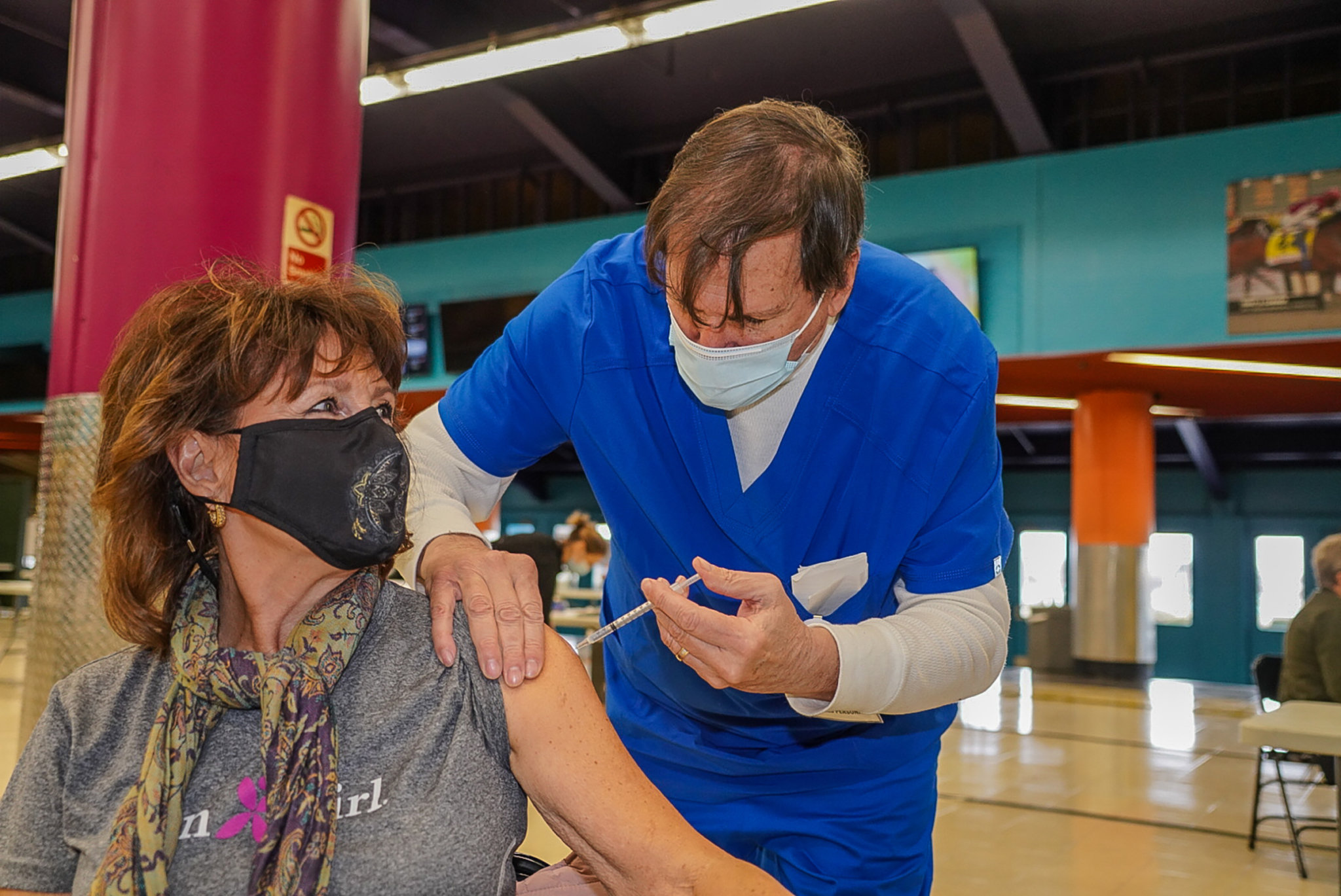 They’re off and running in the COVID-19 vaccination race at Queens ...