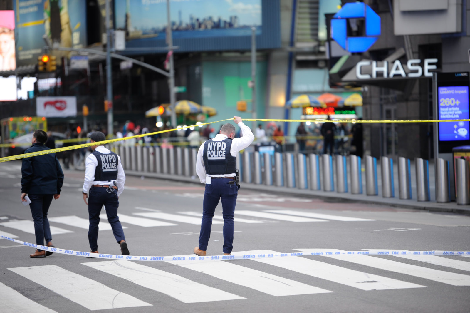 Three people wounded in Times Square shooting as cops seek suspects ...