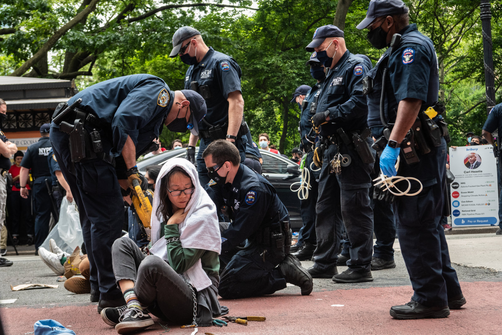 Climate activists cuffed at Downtown protest over Public Renewables Act ...