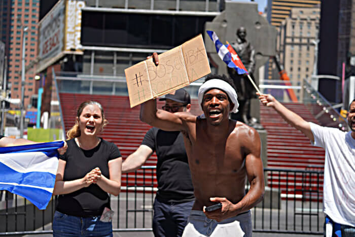 New Yorkers show solidarity at Times Square rally with Cubans seeking ...