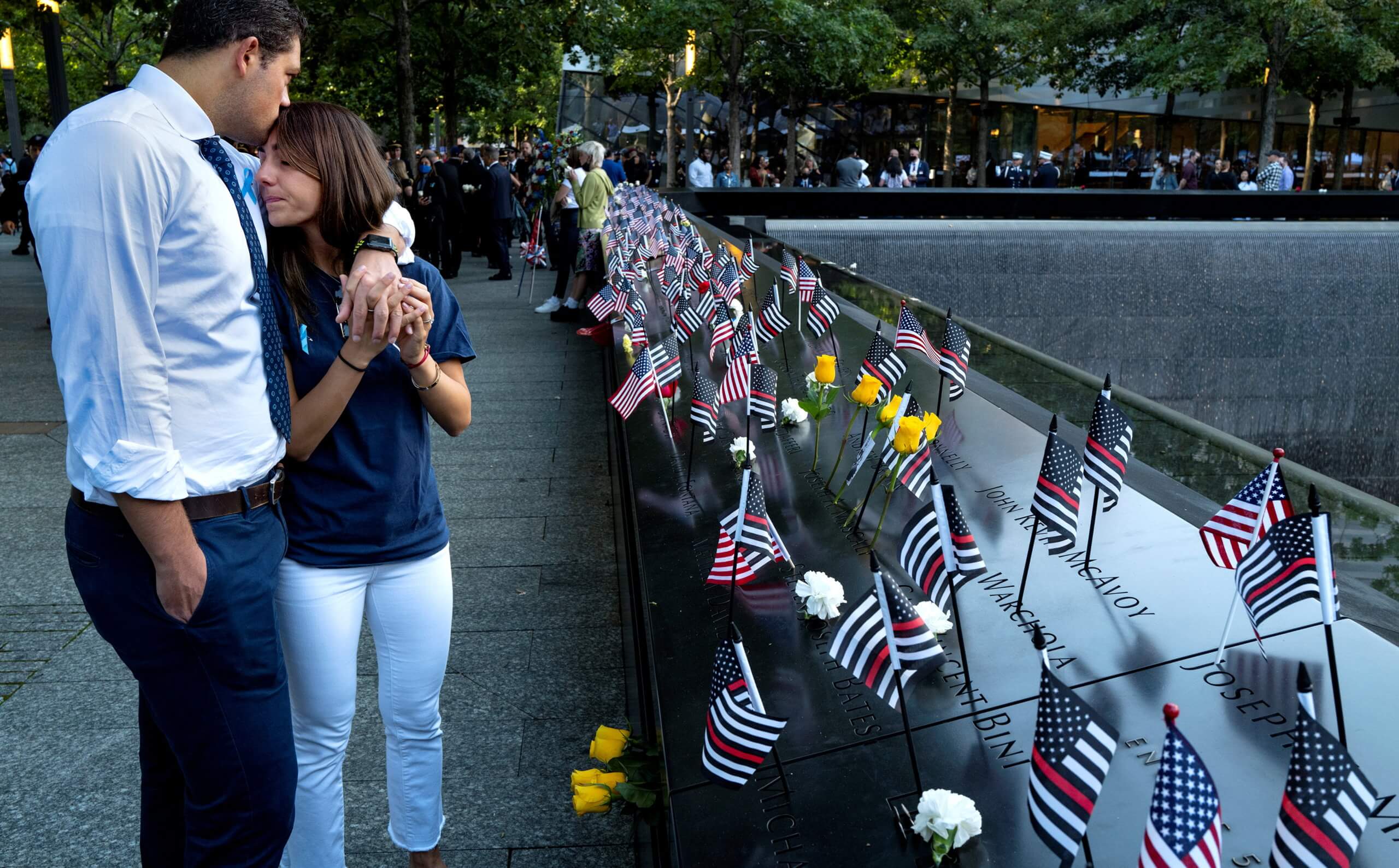 PHOTOS: Tears of grief and remembrance at 9/11 memorial on 20th ...