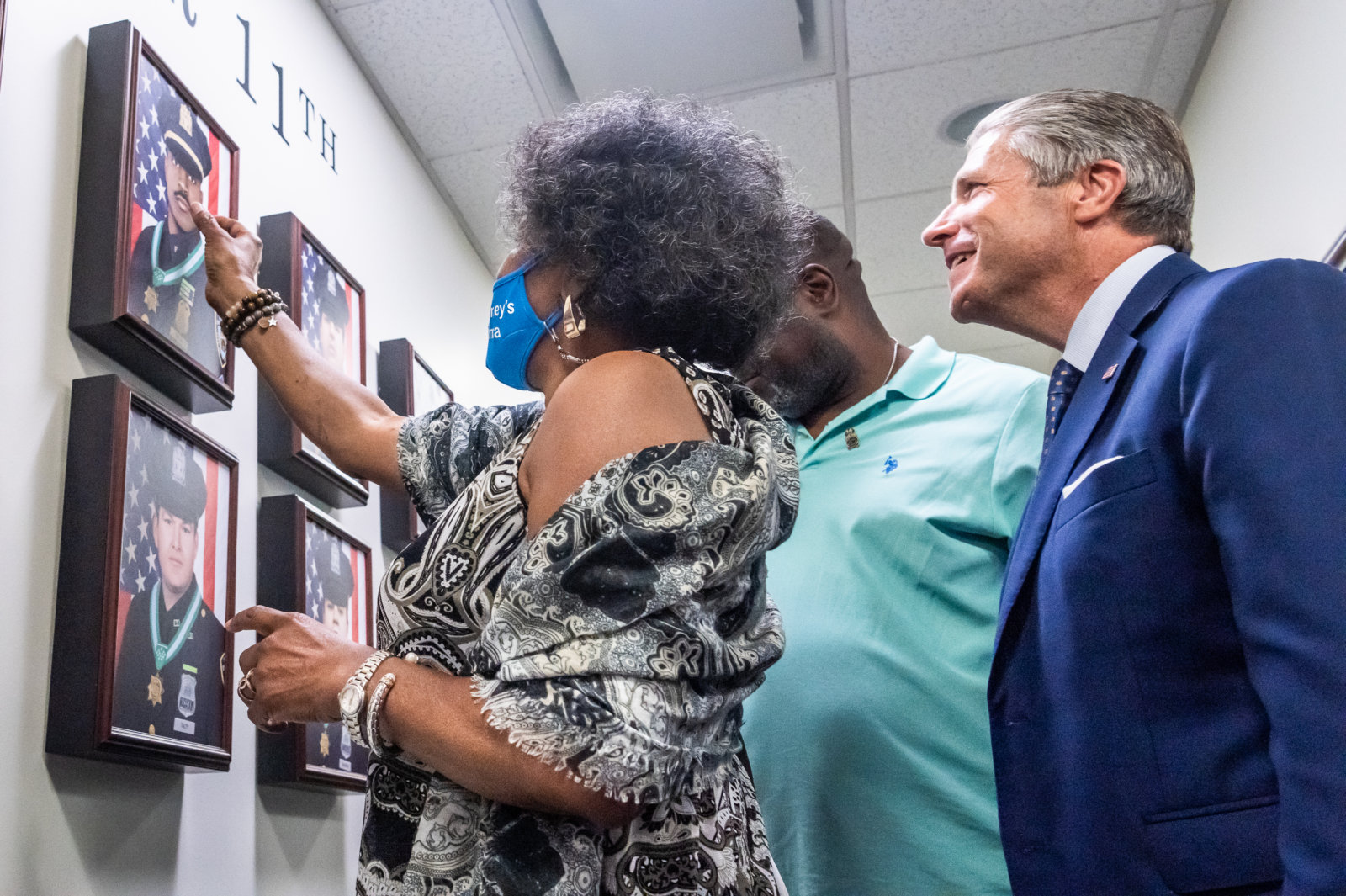 ’23 Remembered’: Memorial wall of portraits honors NYPD officers killed ...