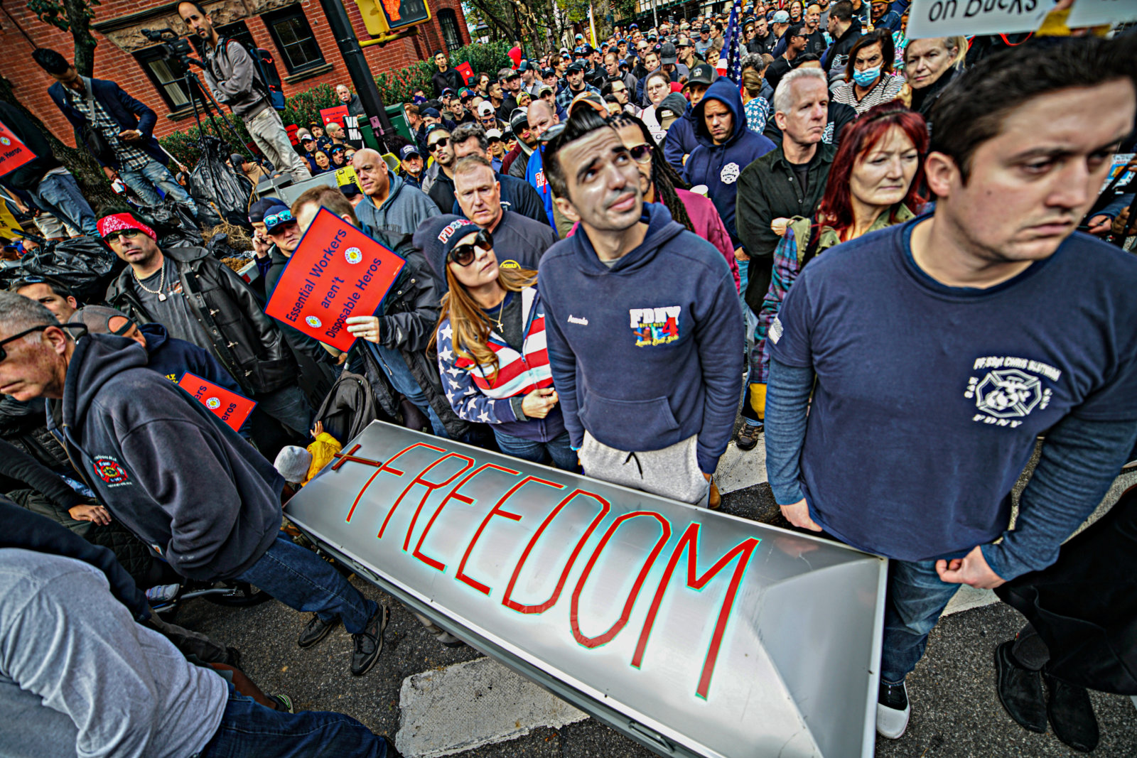 Mad as hell and not going to take the shot: Hundreds march against NYC ...