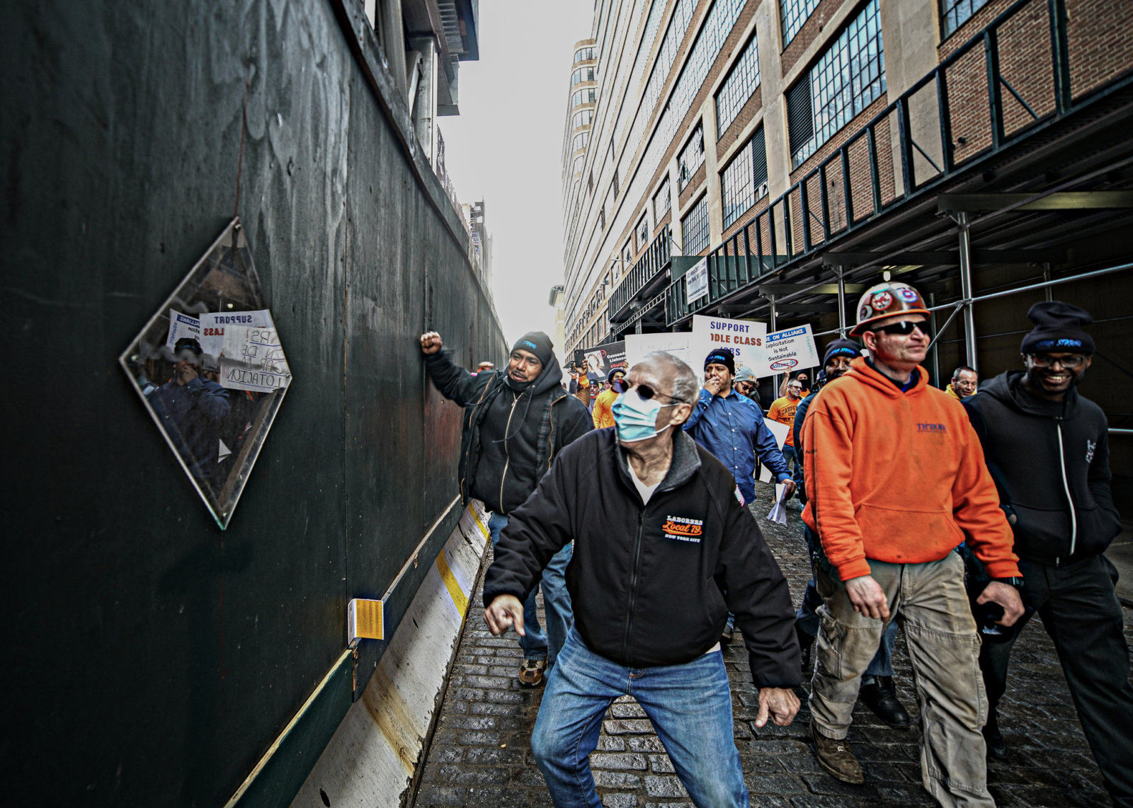 Hundreds of union employees protest alleged exploitative working ...