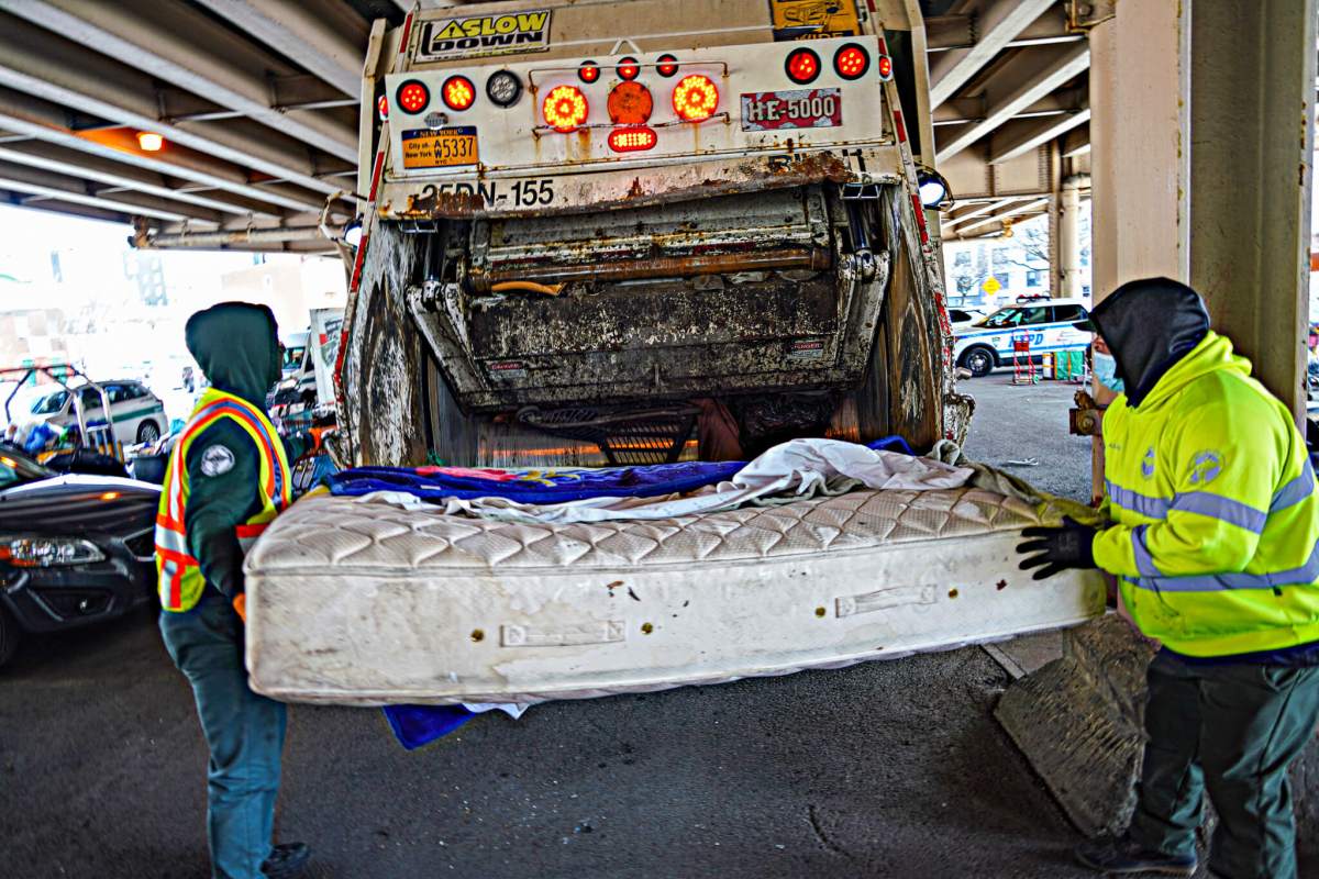 Cops, sanitation clear homeless encampment under BQE as Adams’ new ...