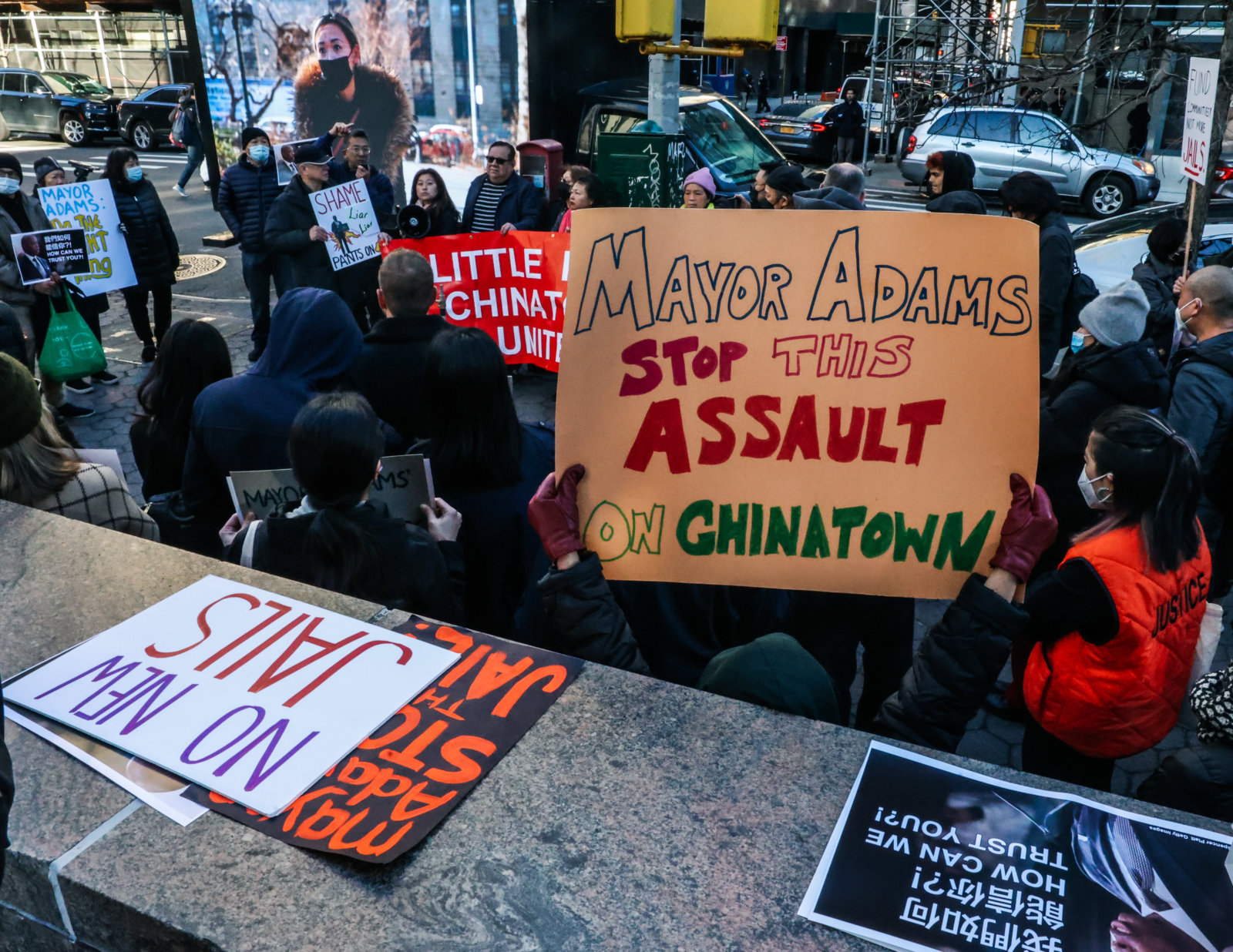 Fenced up: Protesters rally in Chinatown as new jail construction ...