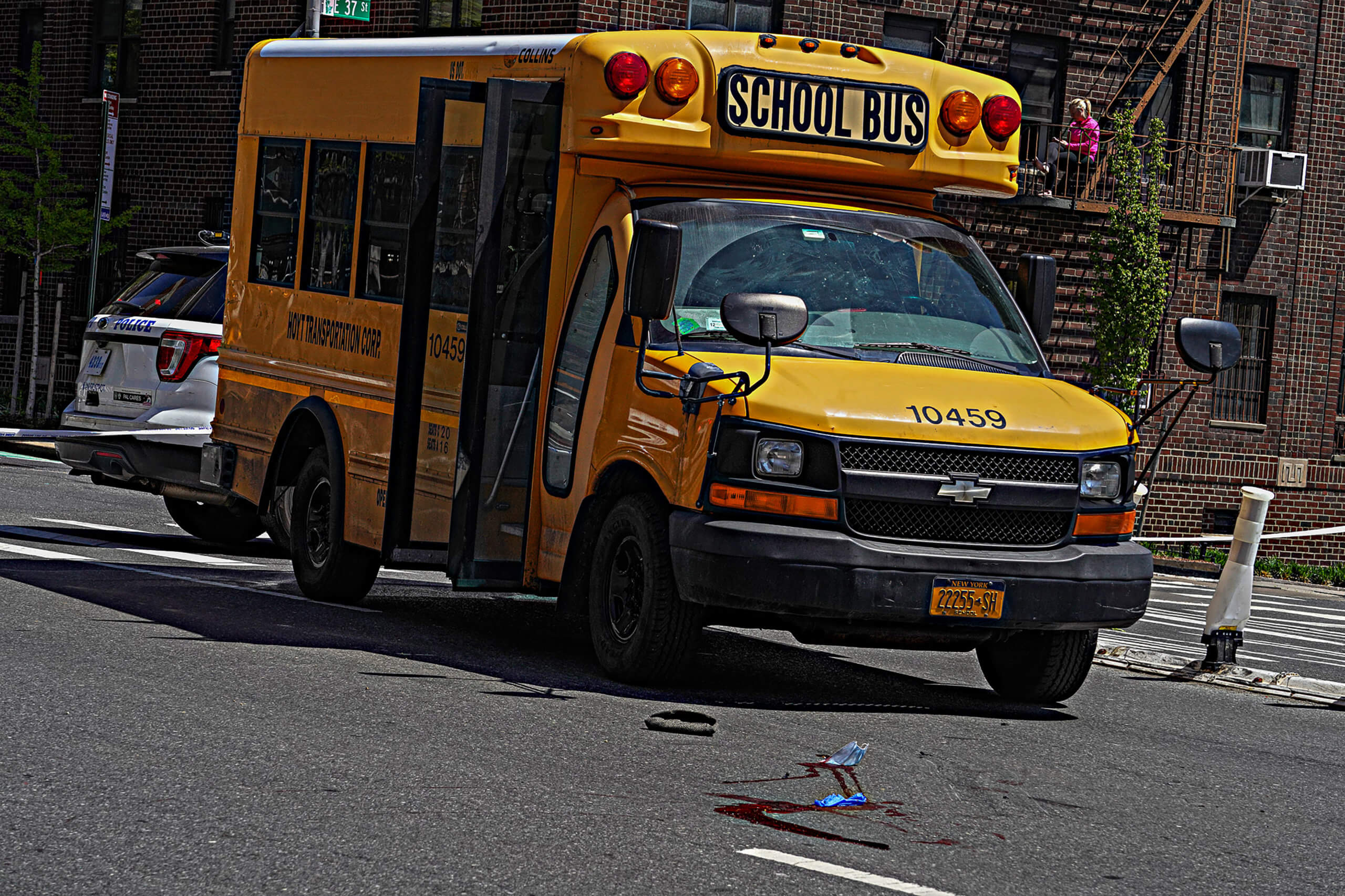Elderly man in critical condition after being trapped under school bus ...