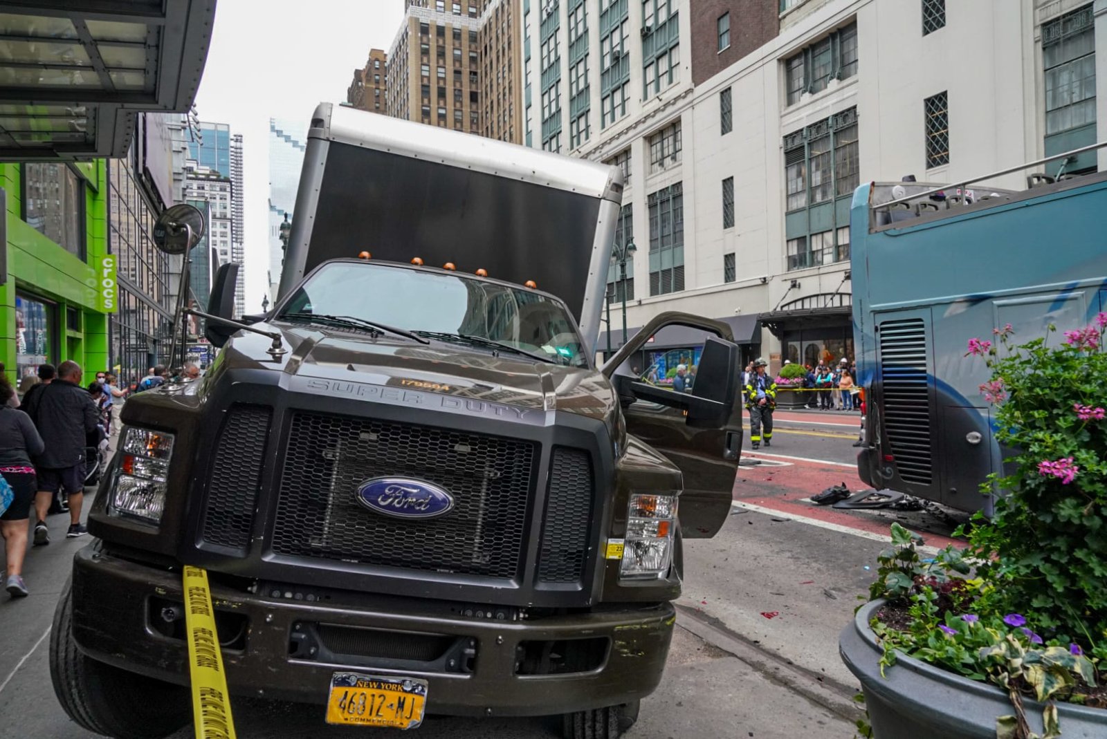 Violent crash involving Revel driver, UPS truck stuns Midtown shoppers ...