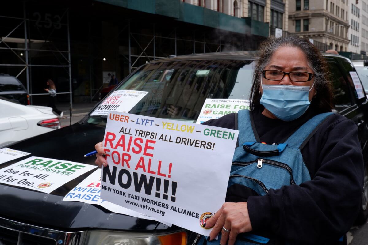 Uber and Lyft drivers push city to raise pay rates amid inflation, gas ...