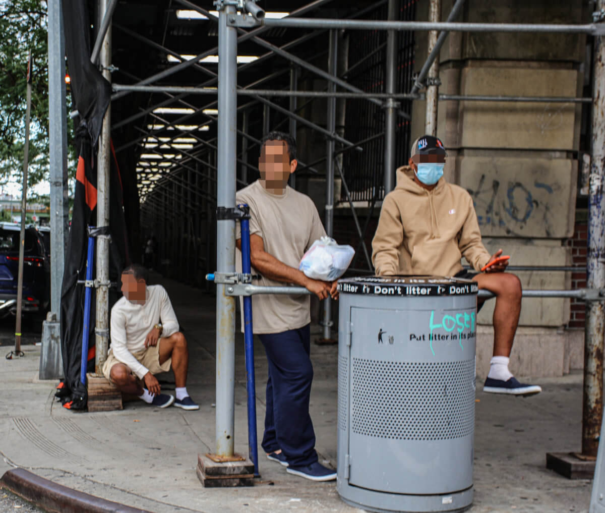 Homeless migrants left to sleep on Midtown streets as city shelters ...
