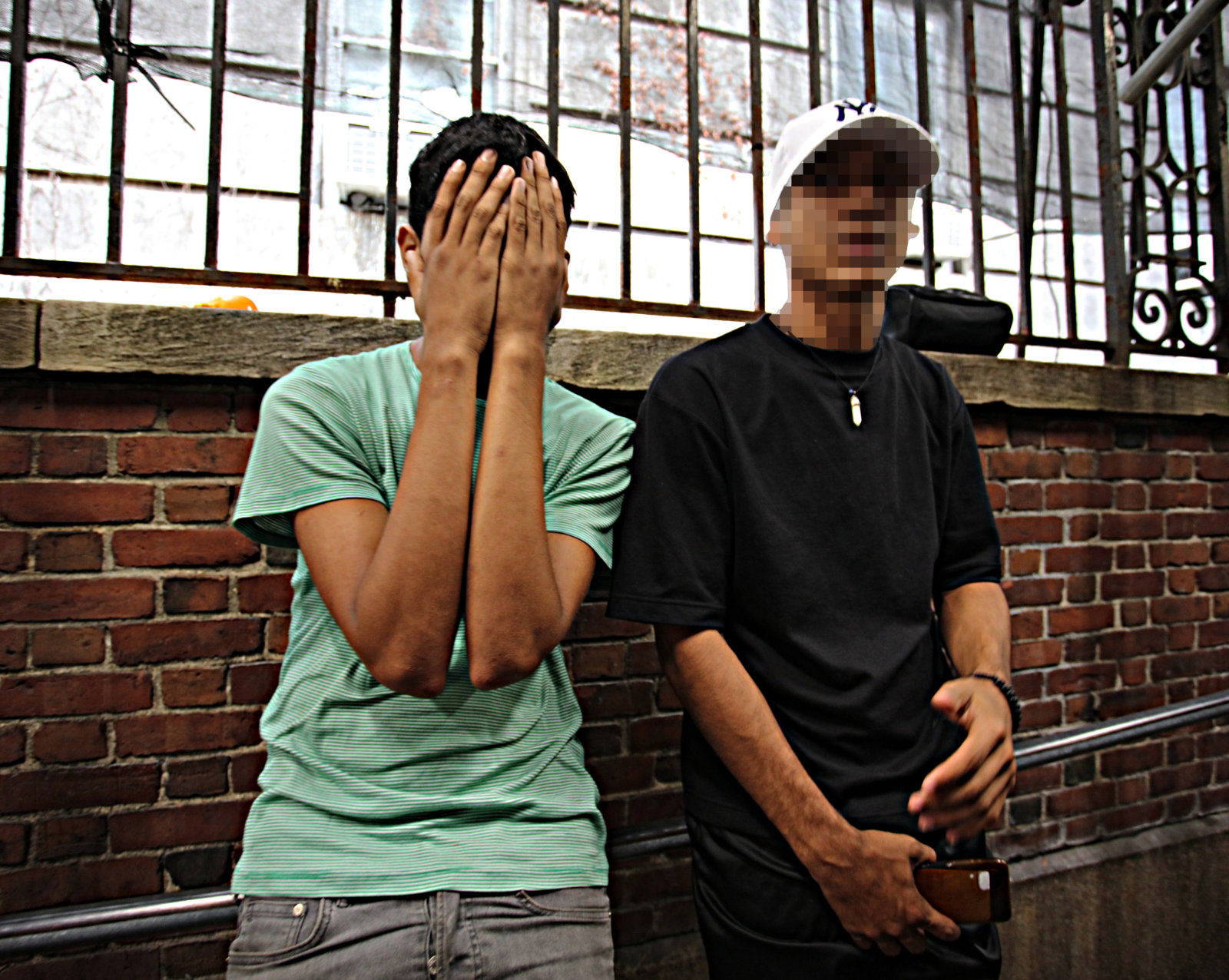 Homeless migrants left to sleep on Midtown streets as city shelters ...