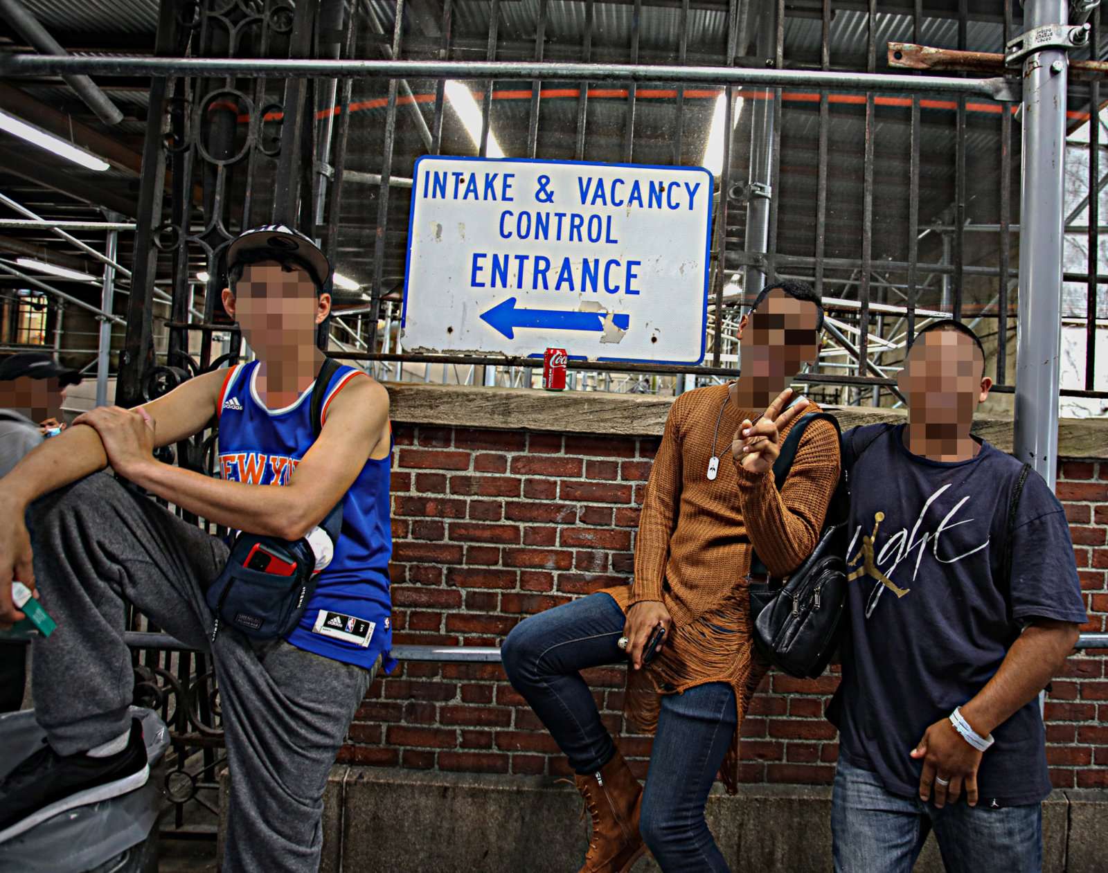 Homeless migrants left to sleep on Midtown streets as city shelters ...