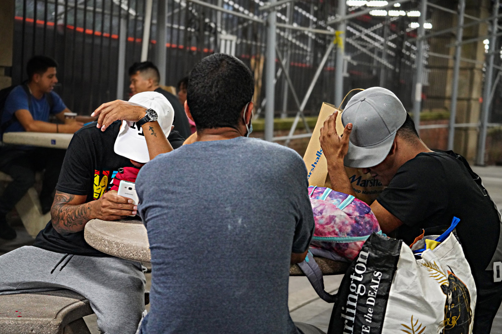 Homeless migrants left to sleep on Midtown streets as city shelters ...