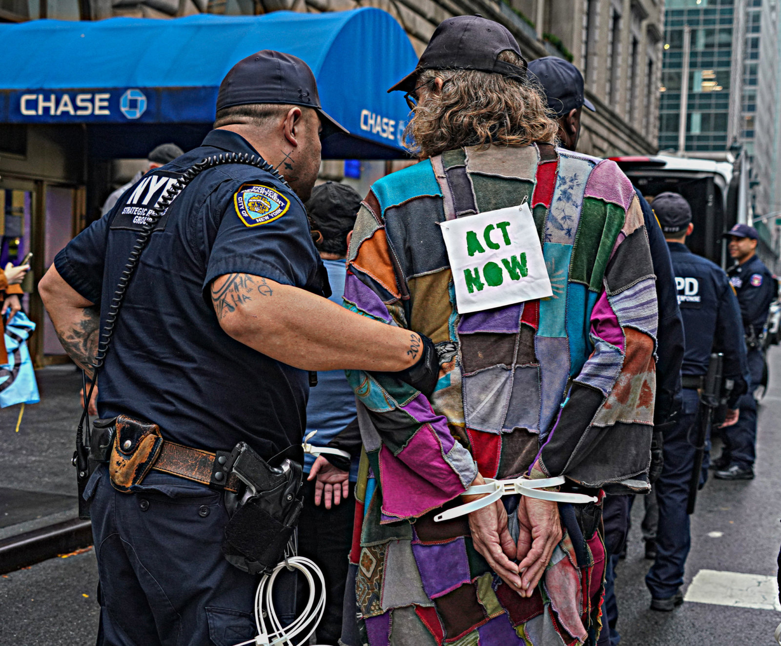 Midtown climate protest ends with 15 activists cuffed for blocking ...