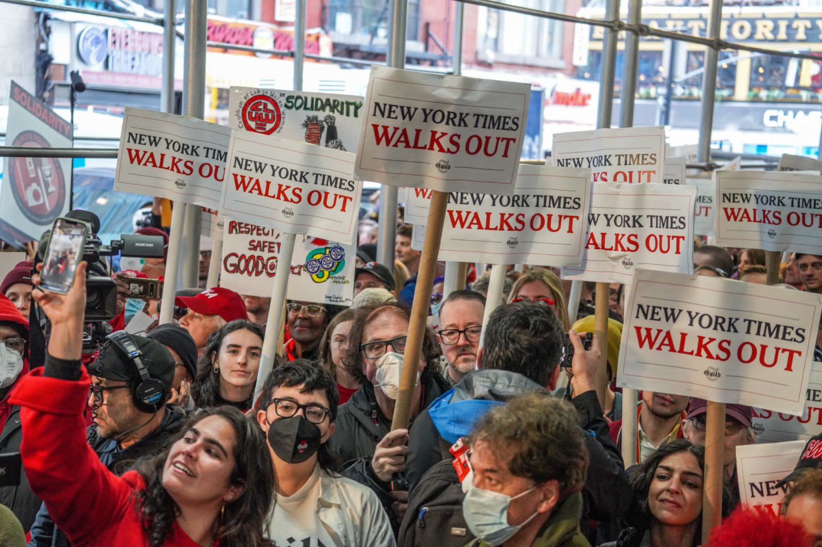 ‘Time to pay me, Gray Lady’: New York Times employees strike for the ...