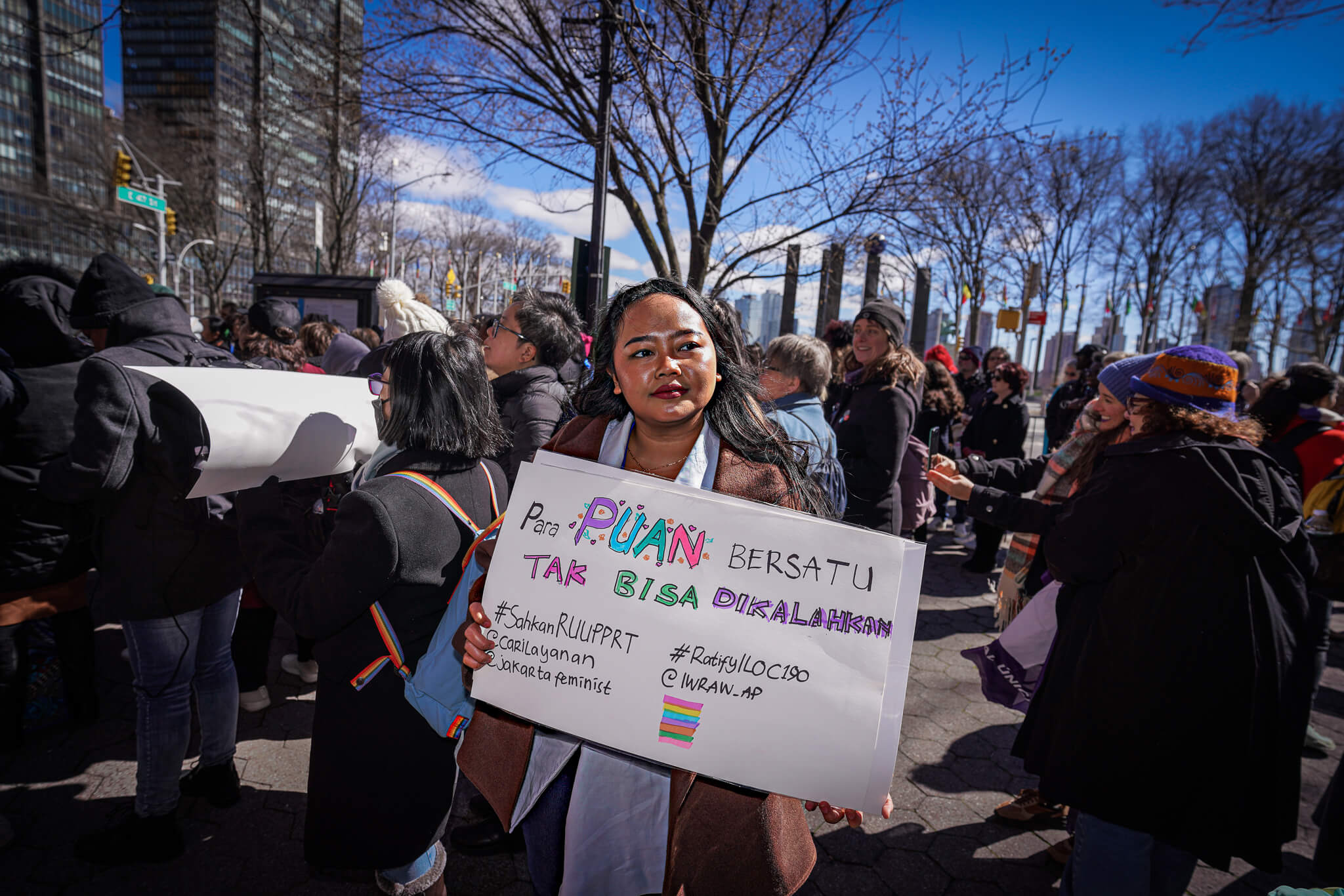 PHOTOS: Over one hundred mark International Women’s Day with rally outside the United Nations ...