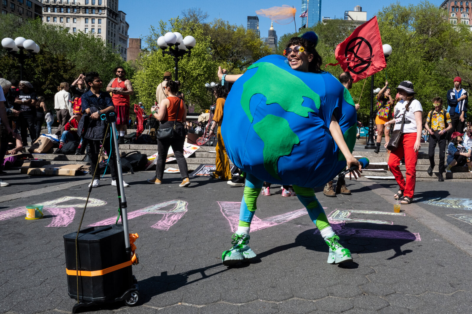 Environmental activists dance against climate and economic injustice at ...