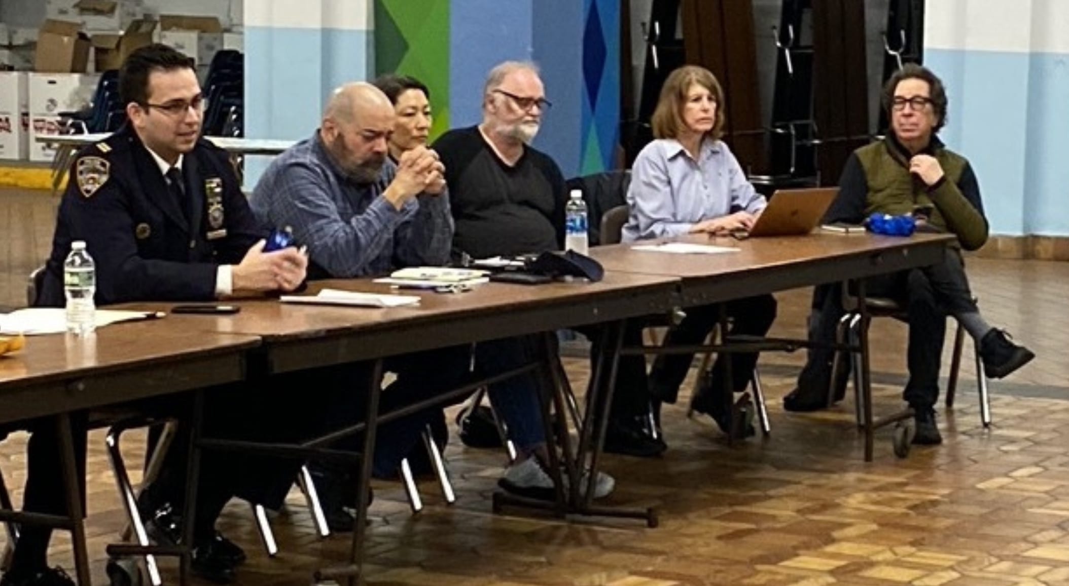 Village Residents Voice Concerns at Precinct Meeting