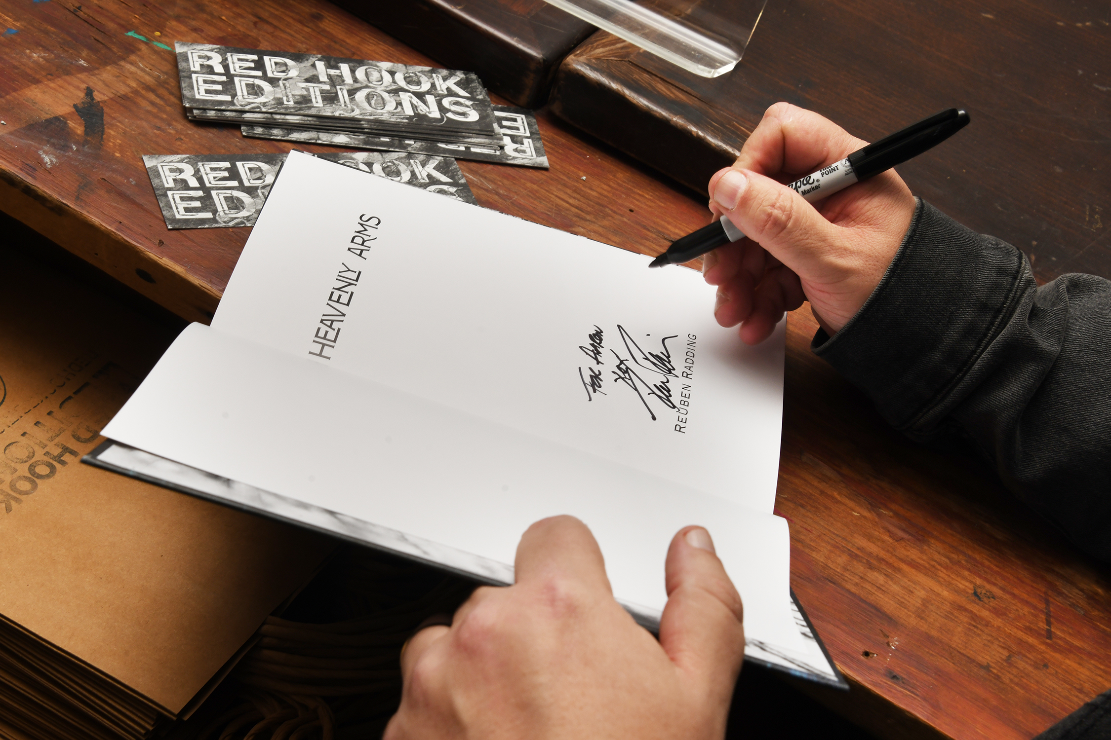 Reuben Radding’s “Heavenly Arms” Captures NYC Moments