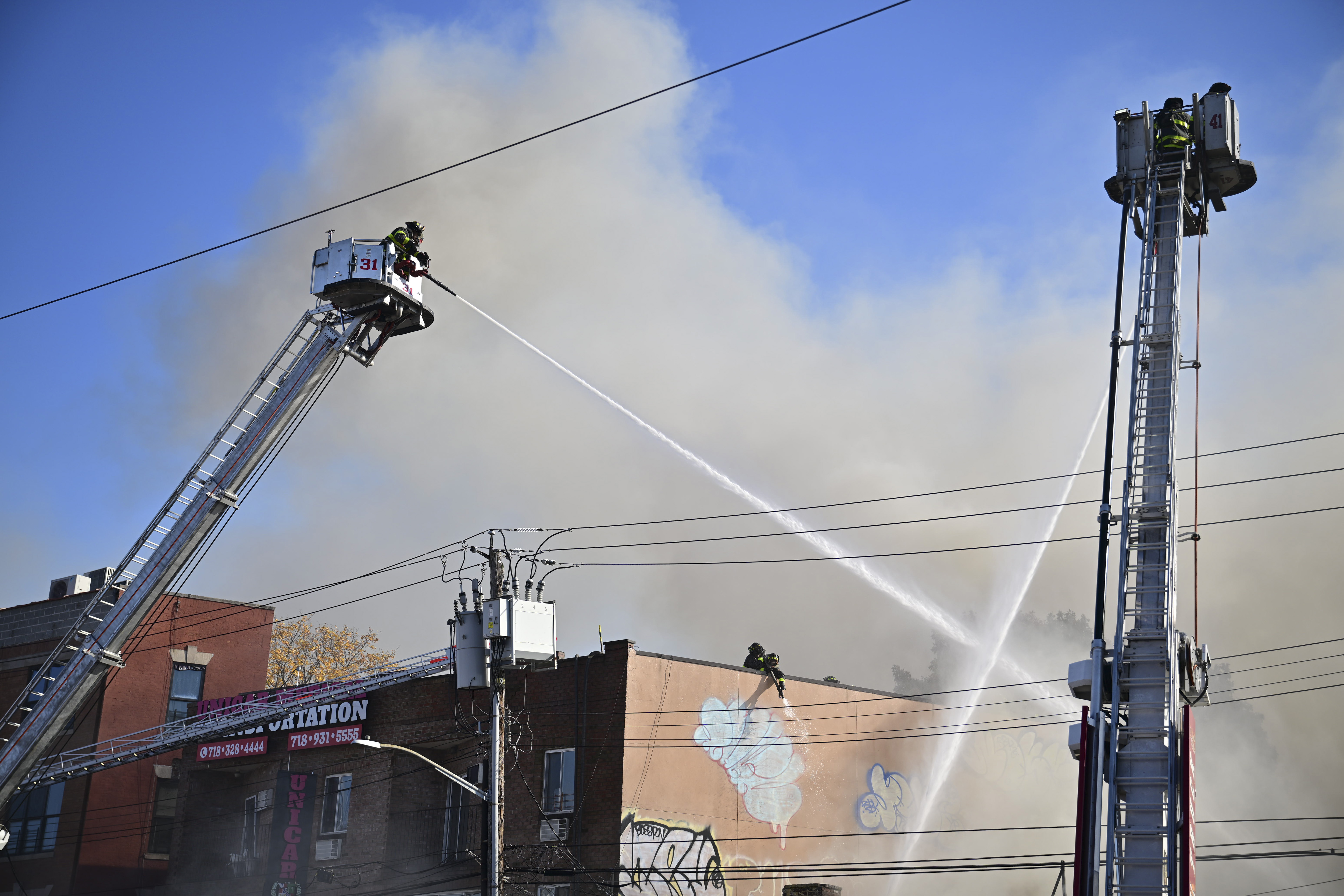 Firefighters battle five-alarm blaze in Bronx apartment building